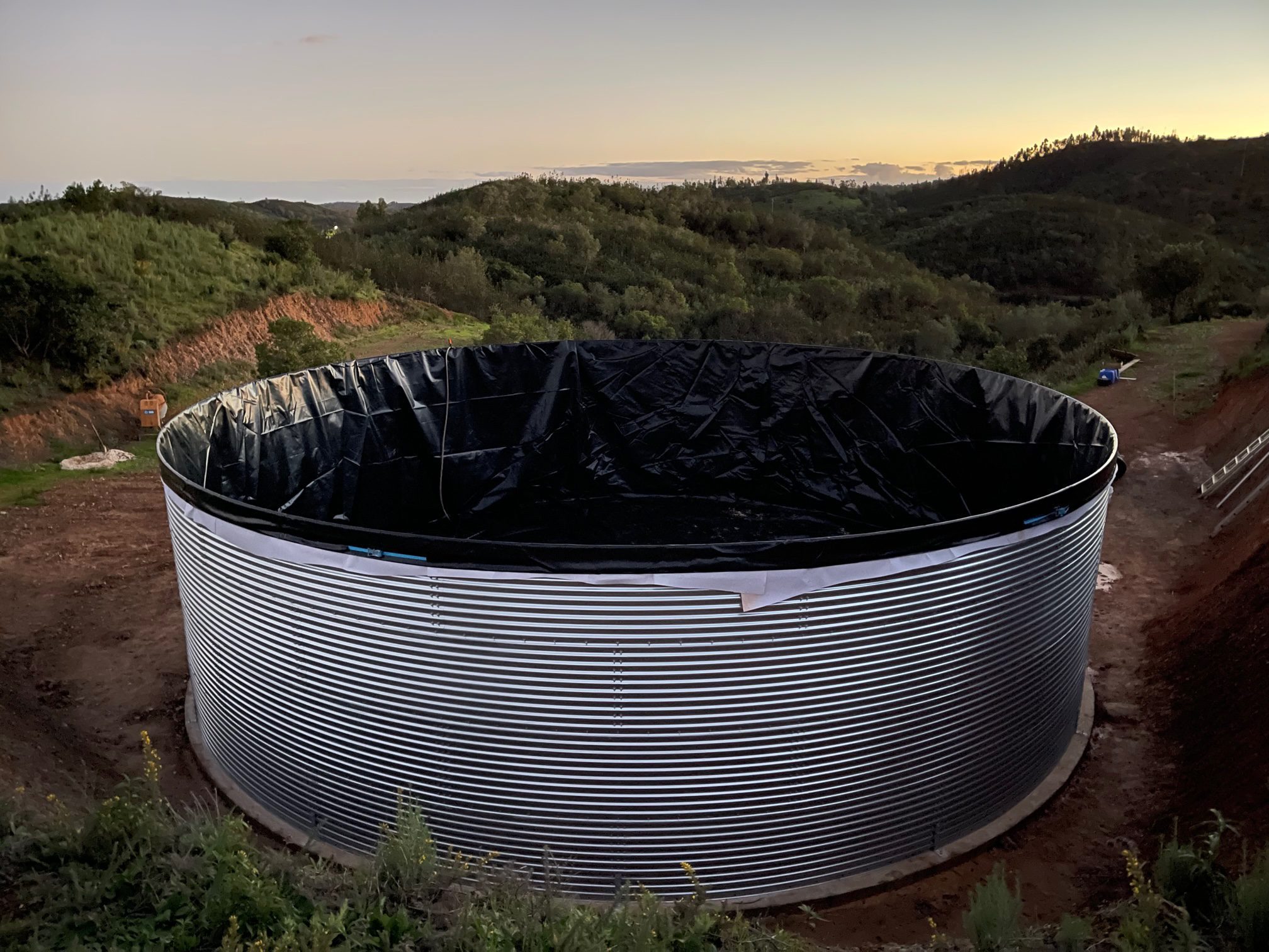 Irrigation tank for a self-sufficient farm and family, Portugal - NPI ...